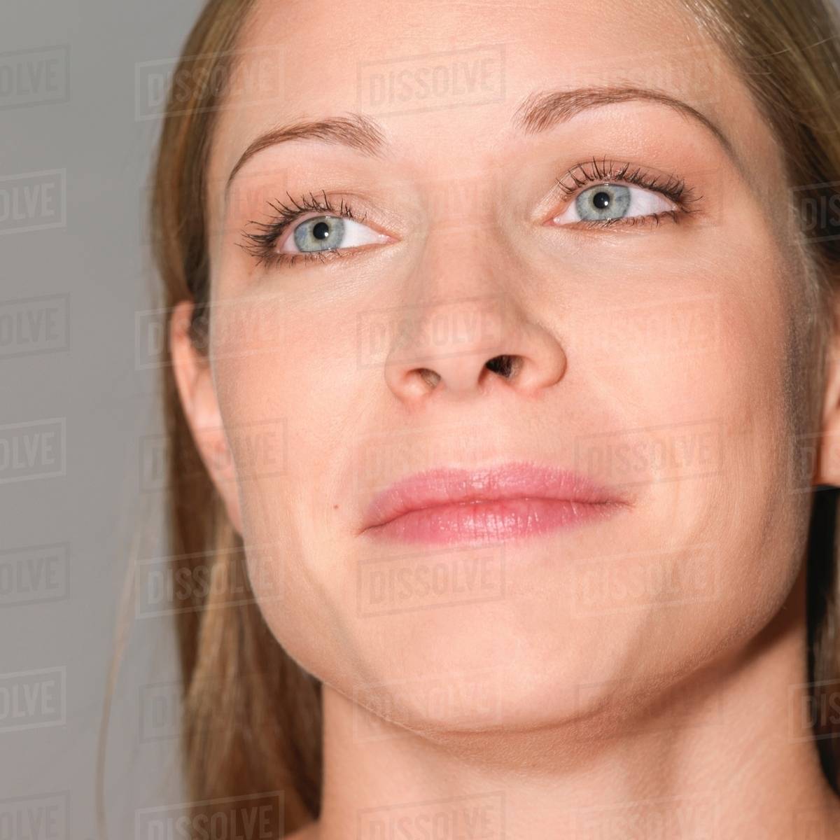 Close up of a young woman\'s face - Royalty-free Stock Photo | Dissolve