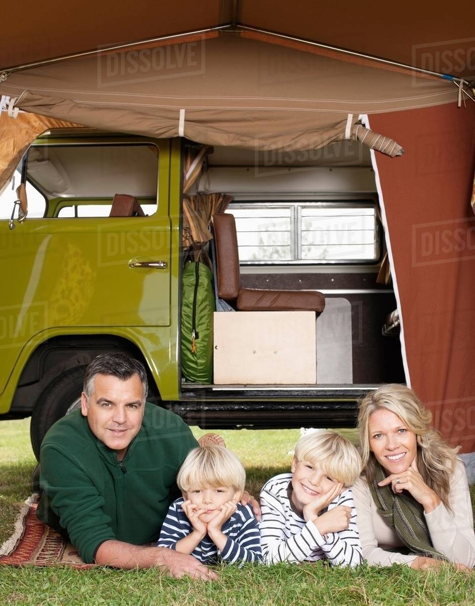 Family in front of camper van - Royalty-free Stock Photo | Dissolve