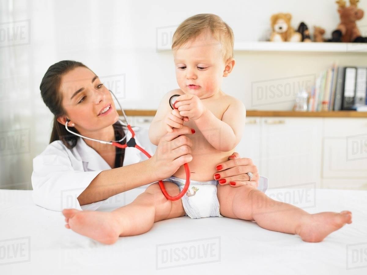 Doctor and baby - Royalty-free Stock Photo | Dissolve