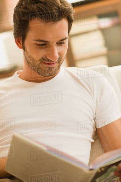 Man reading a book - Royalty-free Stock Photo | Dissolve