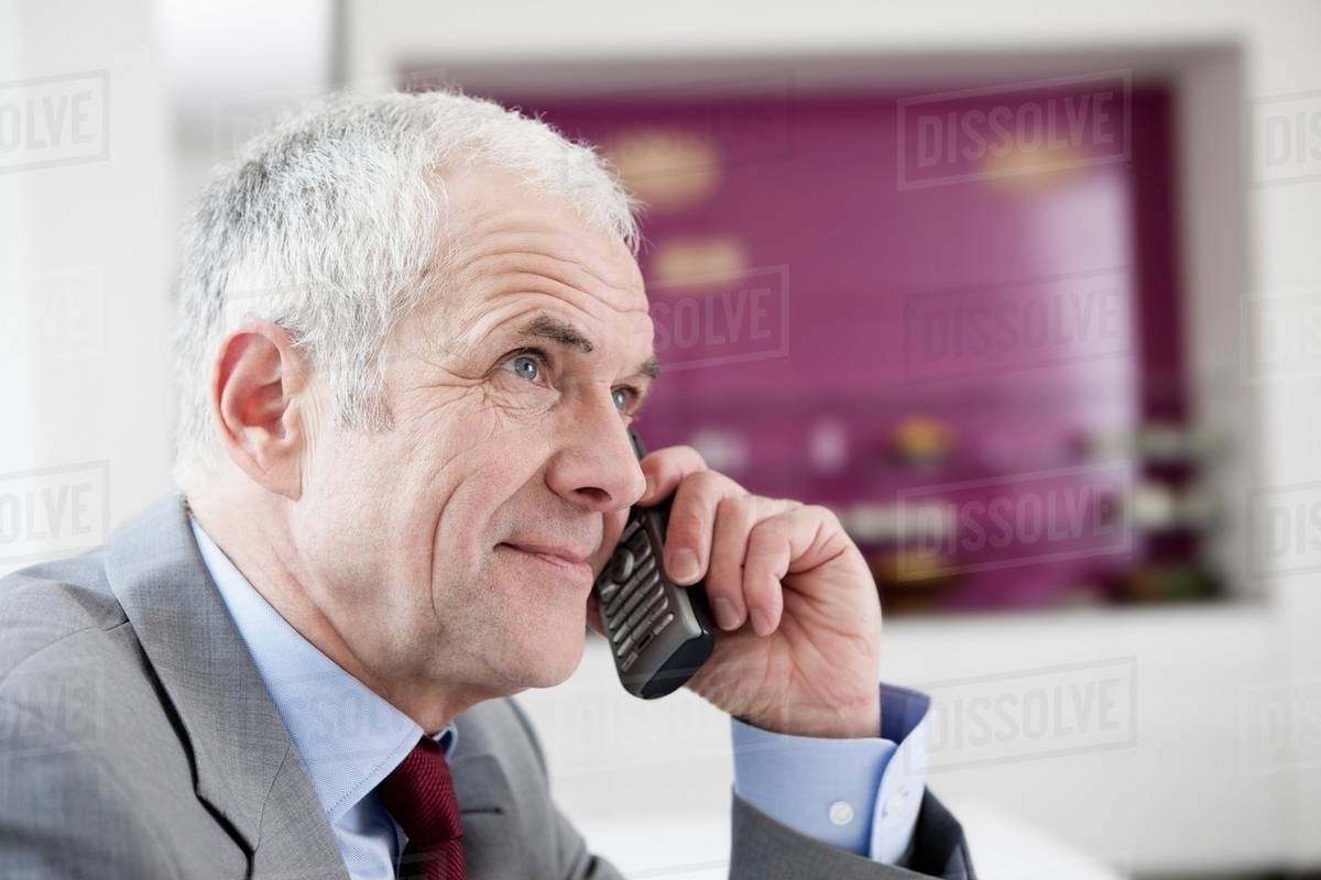 Businessman phoning - Royalty-free Stock Photo | Dissolve