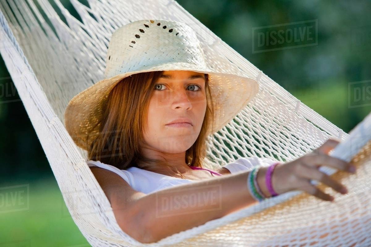 Girl in a hammock - Royalty-free Stock Photo | Dissolve