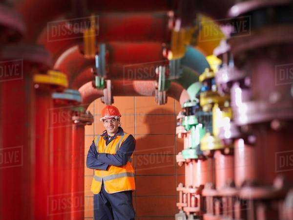 Worker In Coal Fired Power Station - Stock Photo - Dissolve