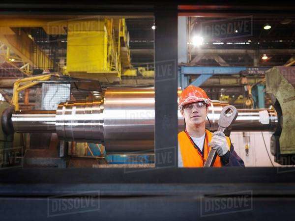 Engineer With Finished Steel Products - Stock Photo - Dissolve