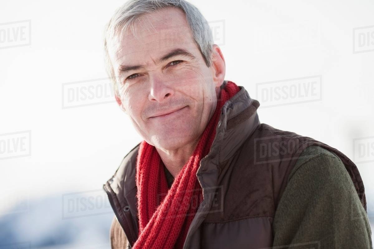 Man contentedly smiling - Stock Photo - Dissolve