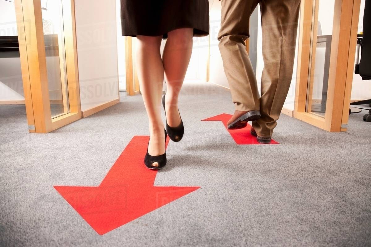 People walking in different directions - Stock Photo - Dissolve