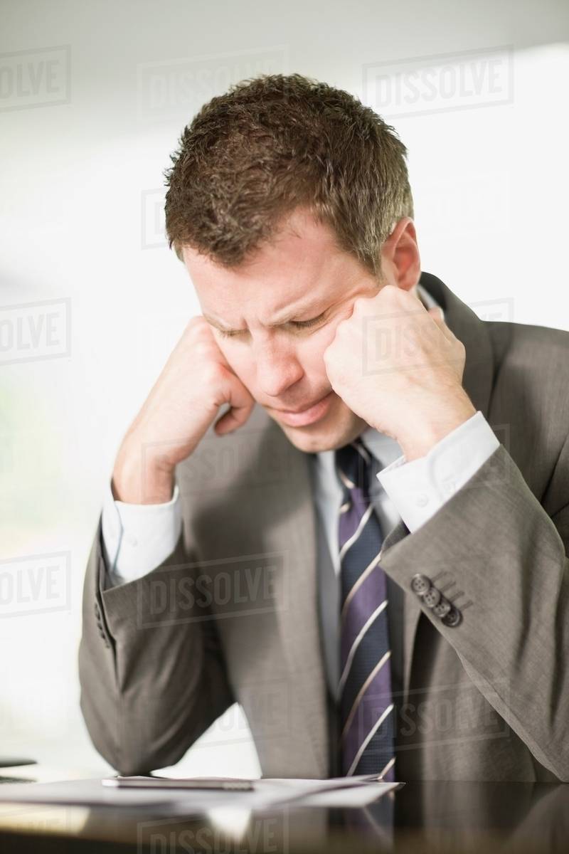 Business man in trouble - Royalty-free Stock Photo | Dissolve