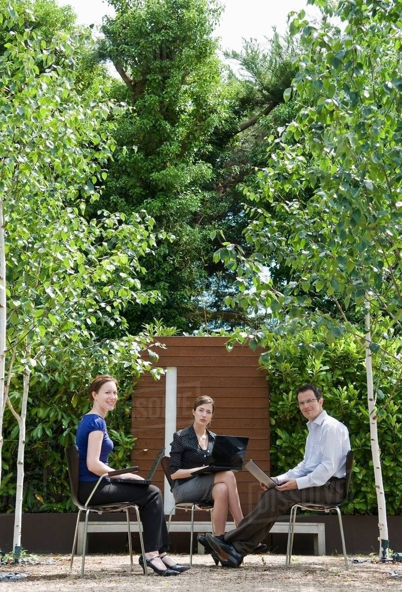 3 colleagues work outside - Stock Photo - Dissolve