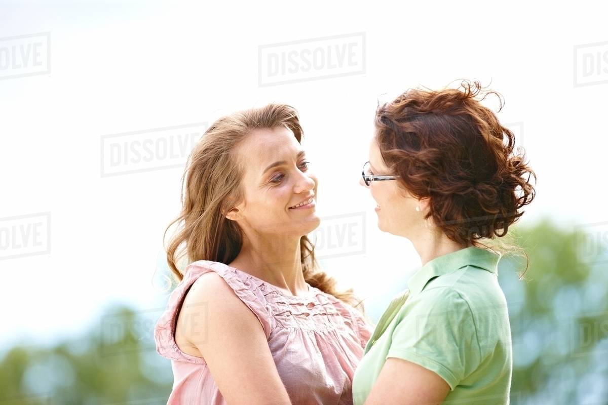 Two women in loving embrace - Royalty-free Stock Photo | Dissolve