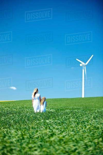 Wind turbine, mother and daughter - Royalty-free Stock Photo | Dissolve