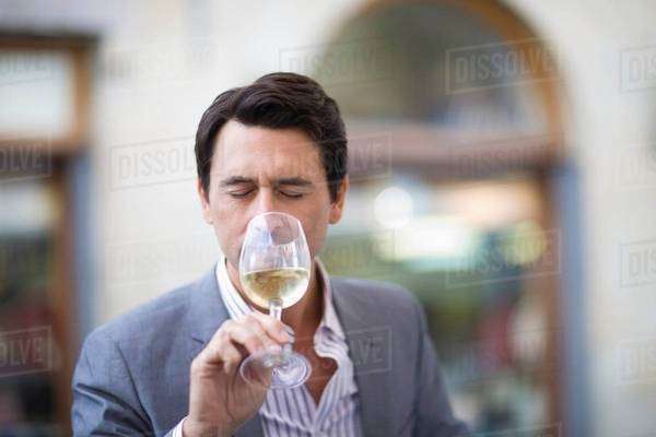 Man tasting whine - Royalty-free Stock Photo | Dissolve