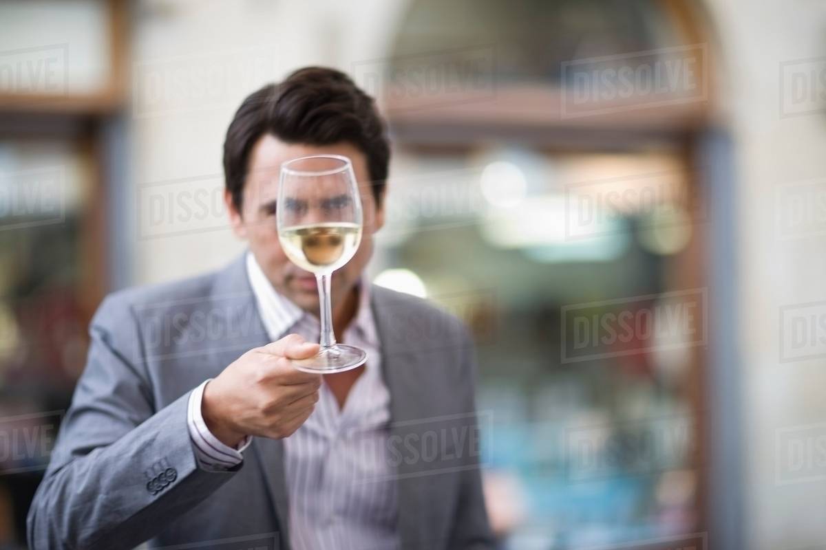 Man tasting whine - Royalty-free Stock Photo | Dissolve