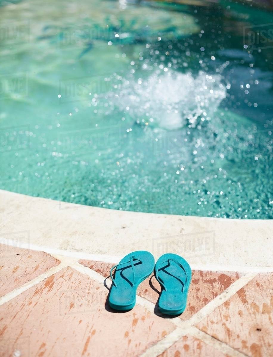 Splash in pool - Stock Photo - Dissolve