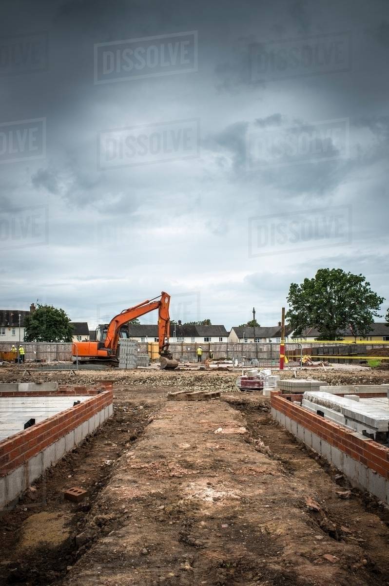 Tractor, building materials on construction site - Royalty-free Stock ...