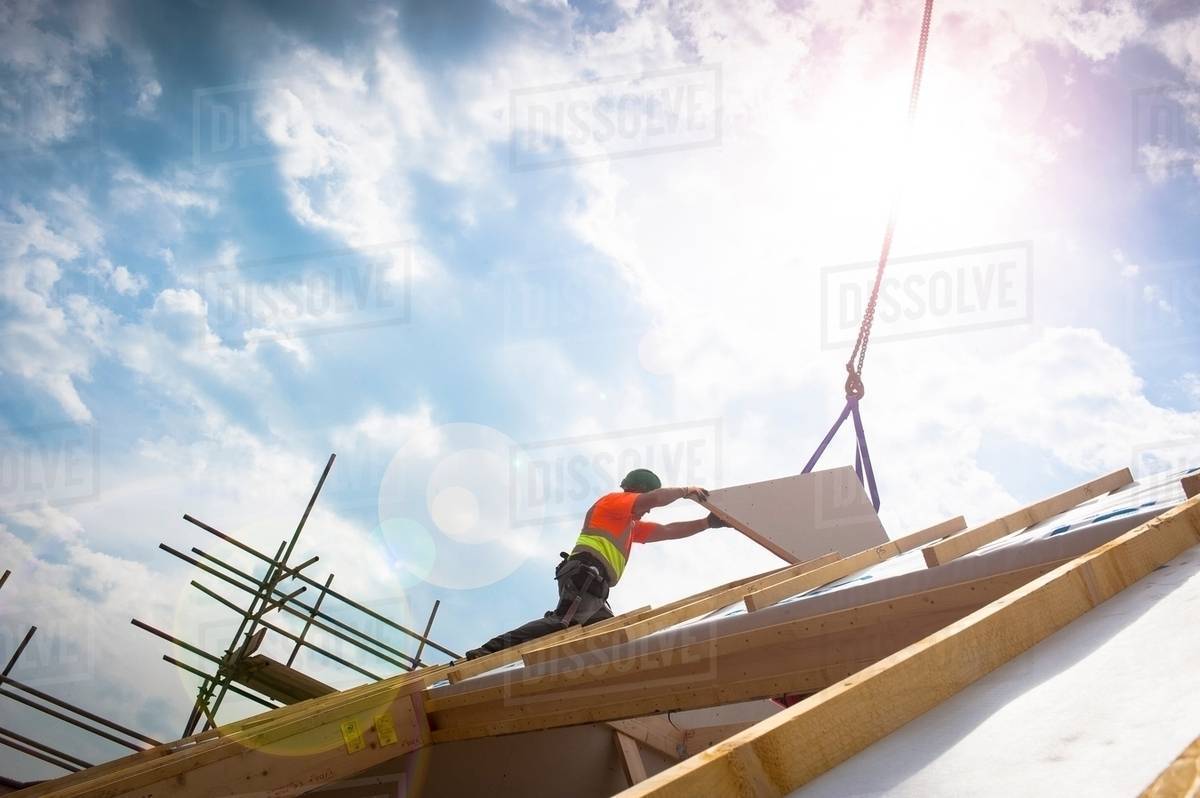 Worker on construction site - Royalty-free Stock Photo | Dissolve