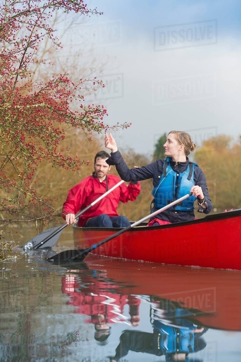 Couple canoeing - Royalty-free Stock Photo | Dissolve