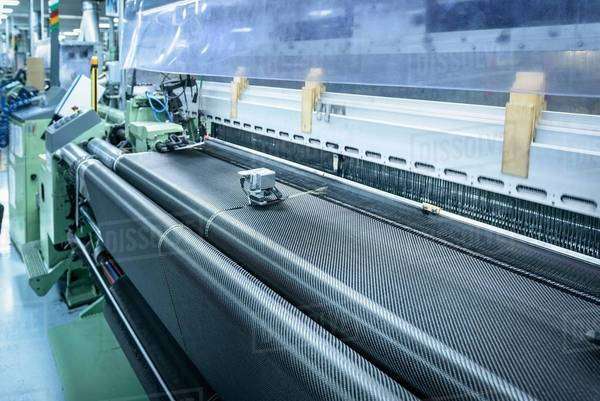 Carbon fibre loom in detail in carbon fibre factory - Stock Photo ...