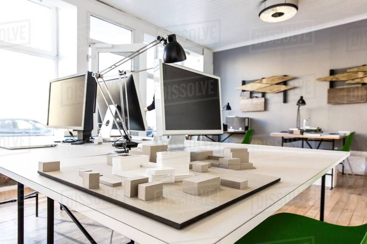 Architectural model on desk in office - Stock Photo - Dissolve