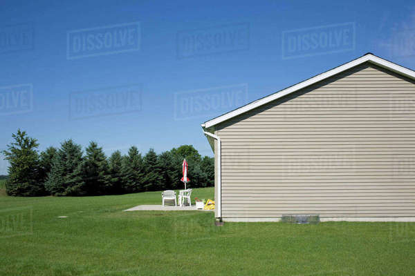 Side view of house - Stock Photo - Dissolve