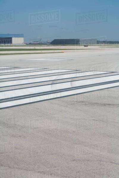 Airport runway, close up - Stock Photo - Dissolve