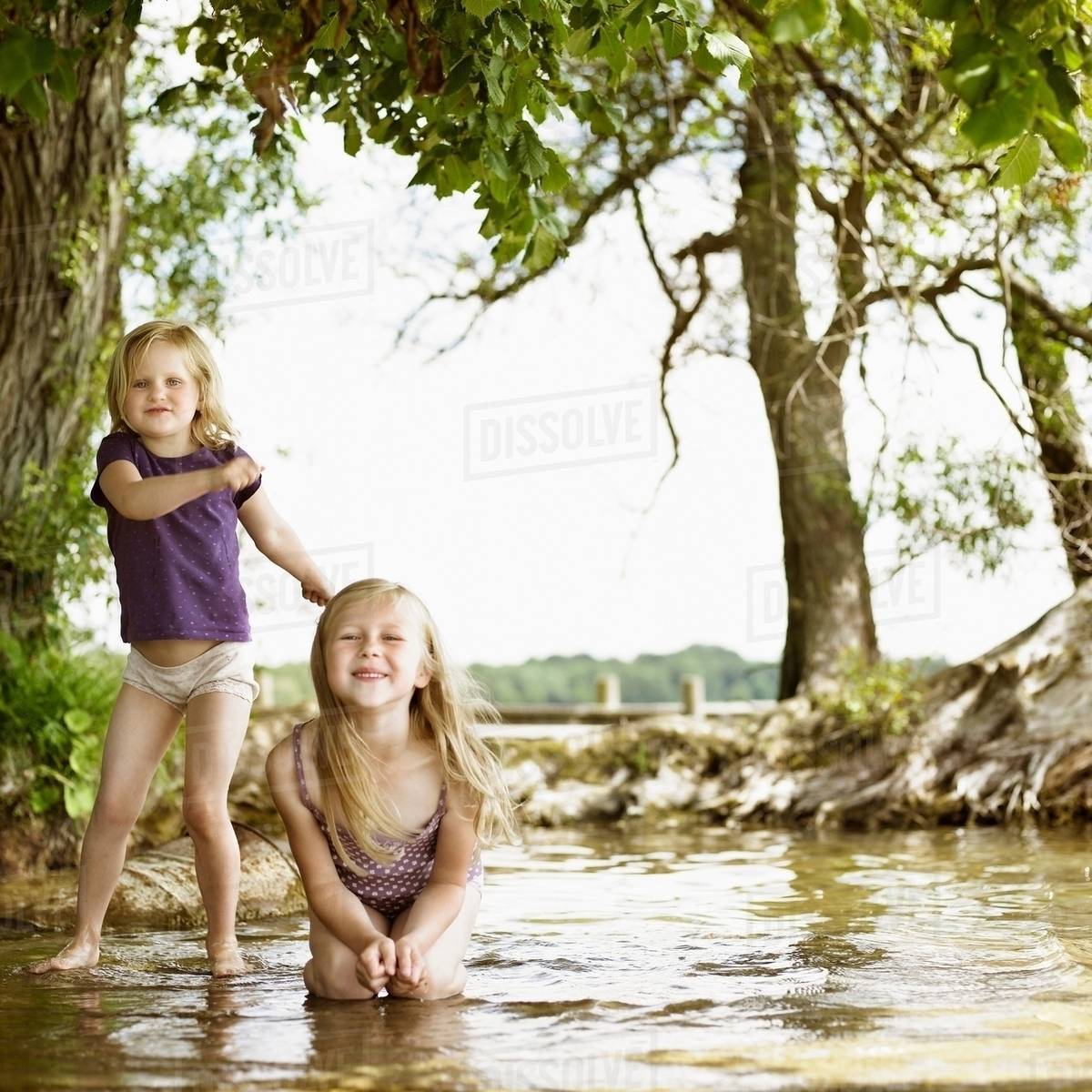 Smiling Girls Playing In Lake Royalty Free Stock Photo Dissolve