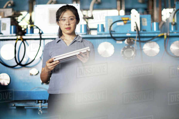 Technician operating machine in factory - Royalty-free Stock Photo ...