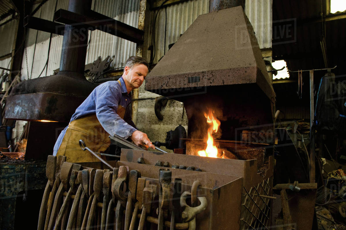 Blacksmith at work - Royalty-free Stock Photo | Dissolve