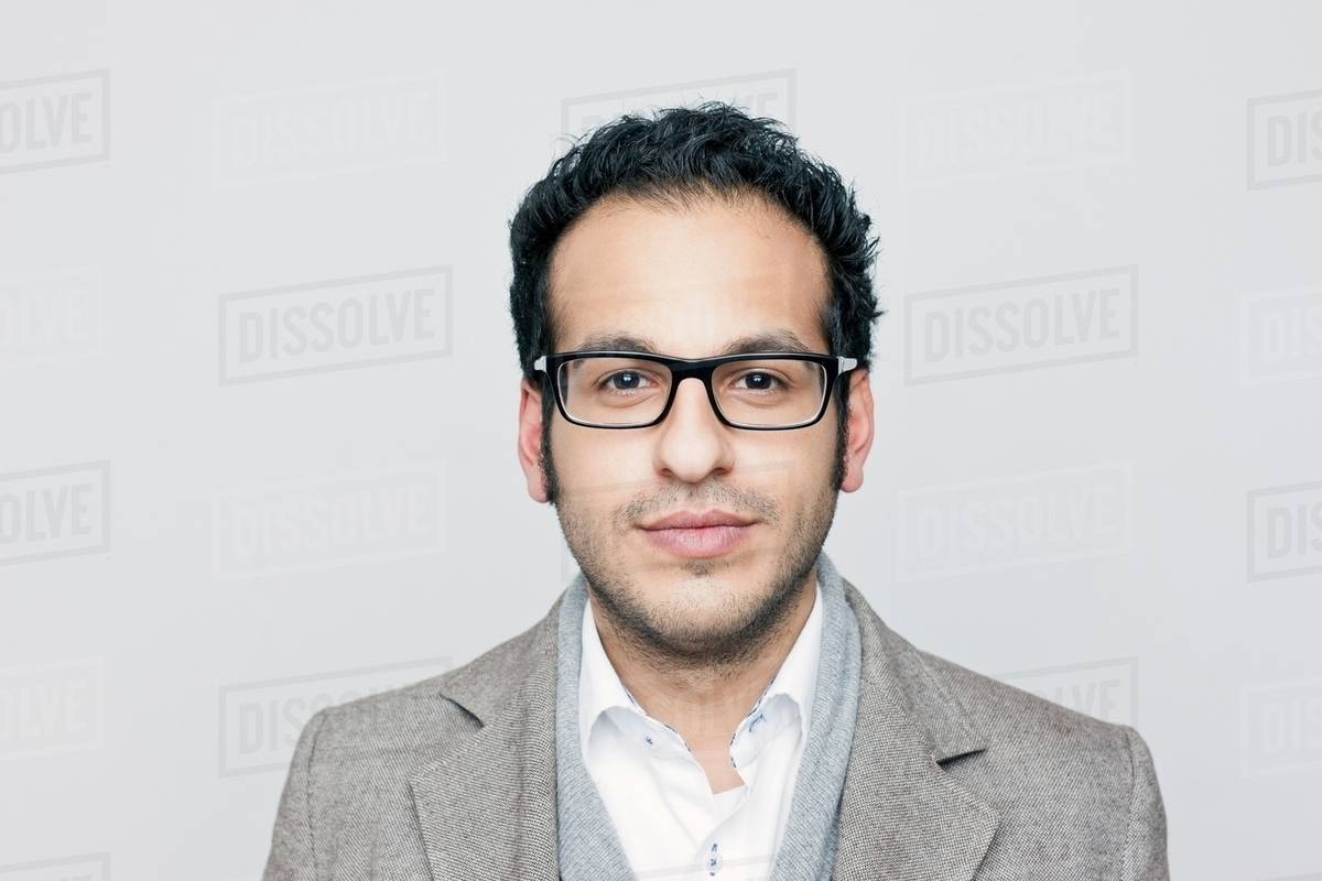 Close up of businessmans face - Stock Photo - Dissolve