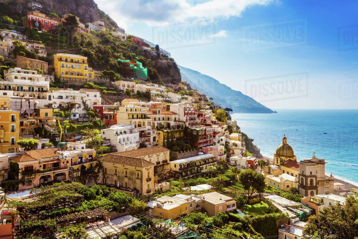 Cliff side buildings by sea, Positano, Amalfi Coast, Italy - Stock ...