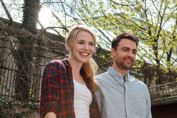 Couple side by side smiling - Royalty-free Stock Photo | Dissolve