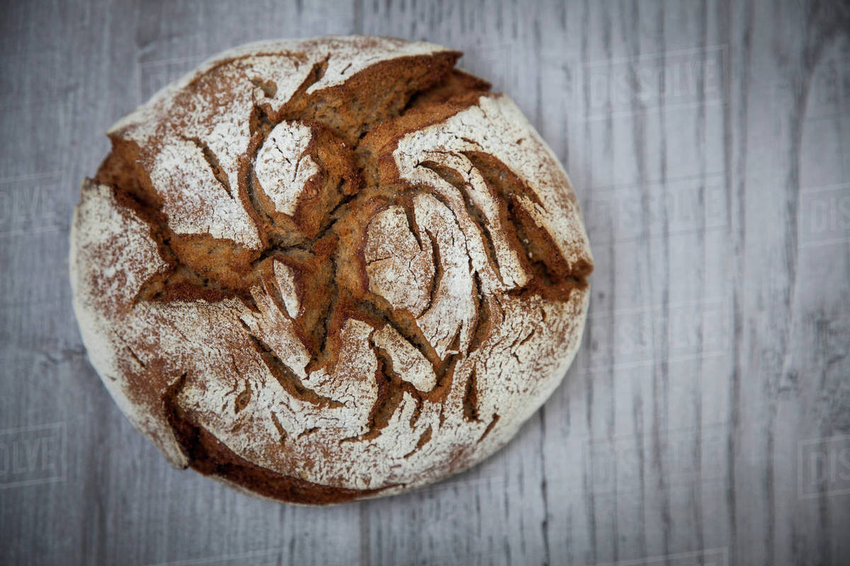 Overhead view of Rye bread (Roggenbrot) on table - Stock Photo - Dissolve