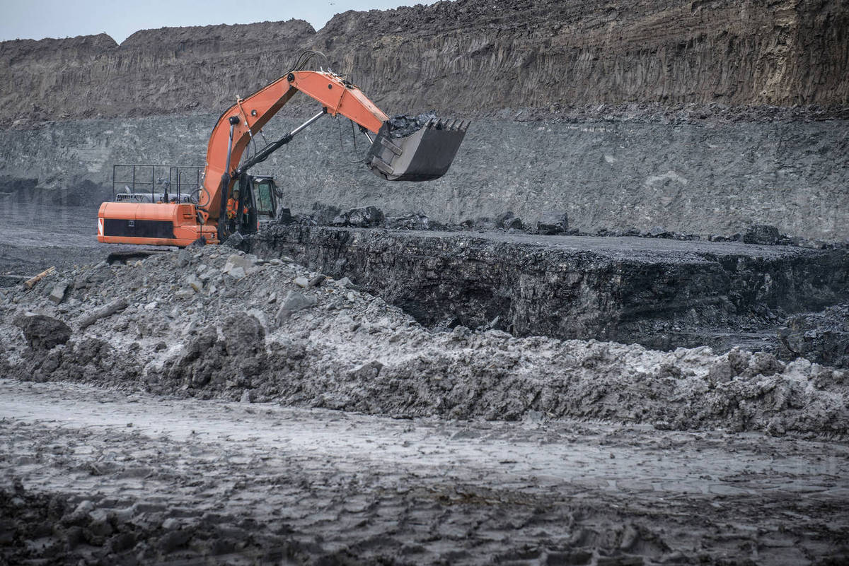 Large digger and geological strata in surface coal mine - Stock Photo ...