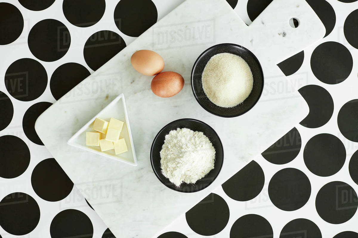 Baking ingredients on cutting board - Royalty-free Stock Photo | Dissolve