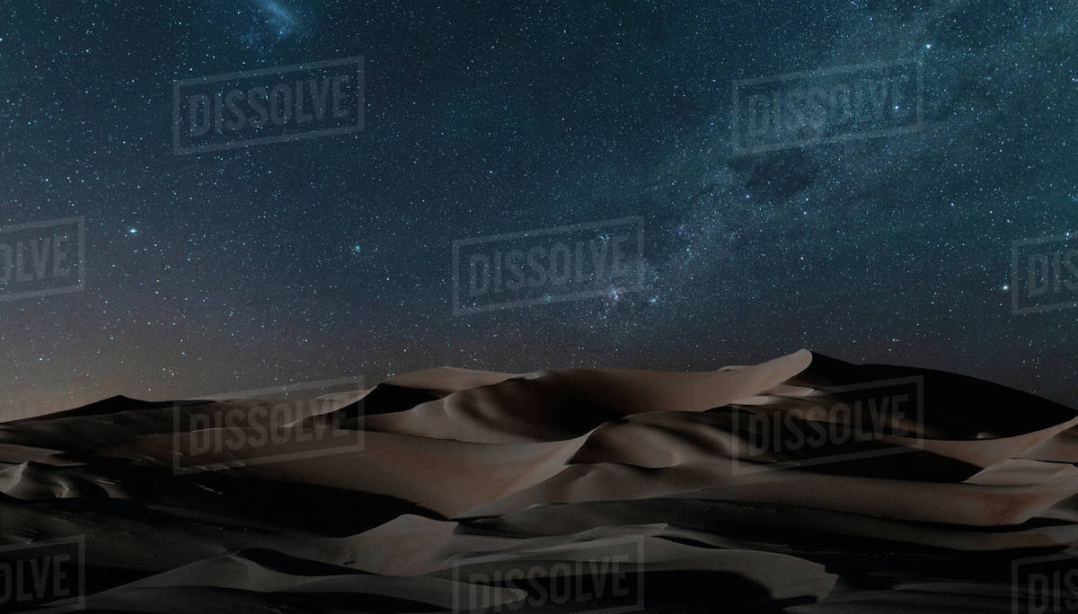 View of dunes under starry night sky, Namib Desert, Namibia - Royalty ...
