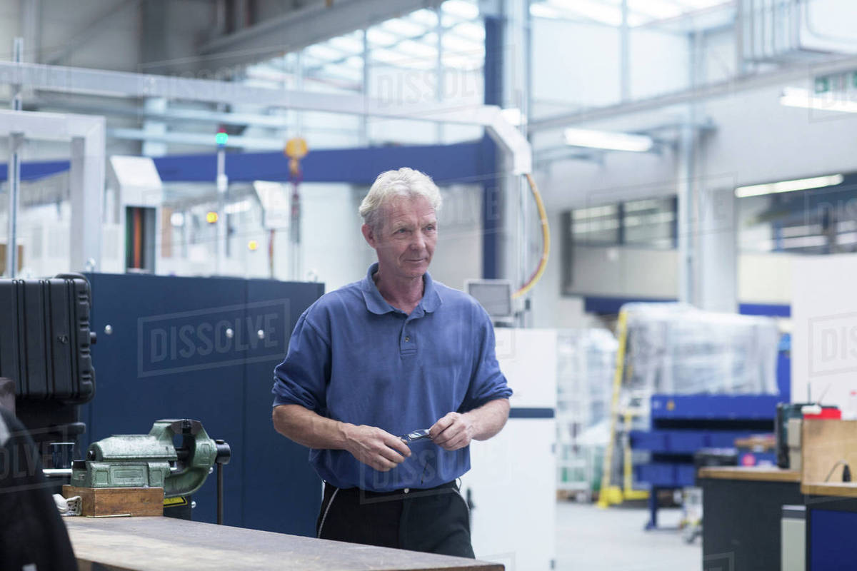 Engineer working in engineering plant - Royalty-free Stock Photo | Dissolve