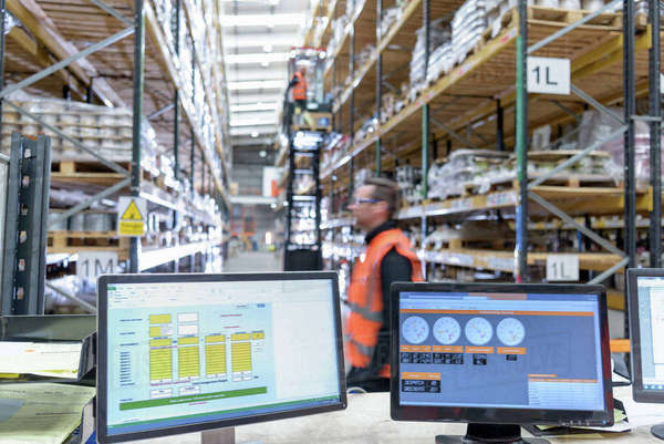 Worker in cable store warehouse at cable storage facility - Stock Photo ...
