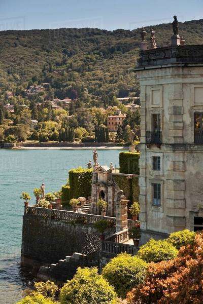 Ornate house built on waterfront - Royalty-free Stock Photo | Dissolve