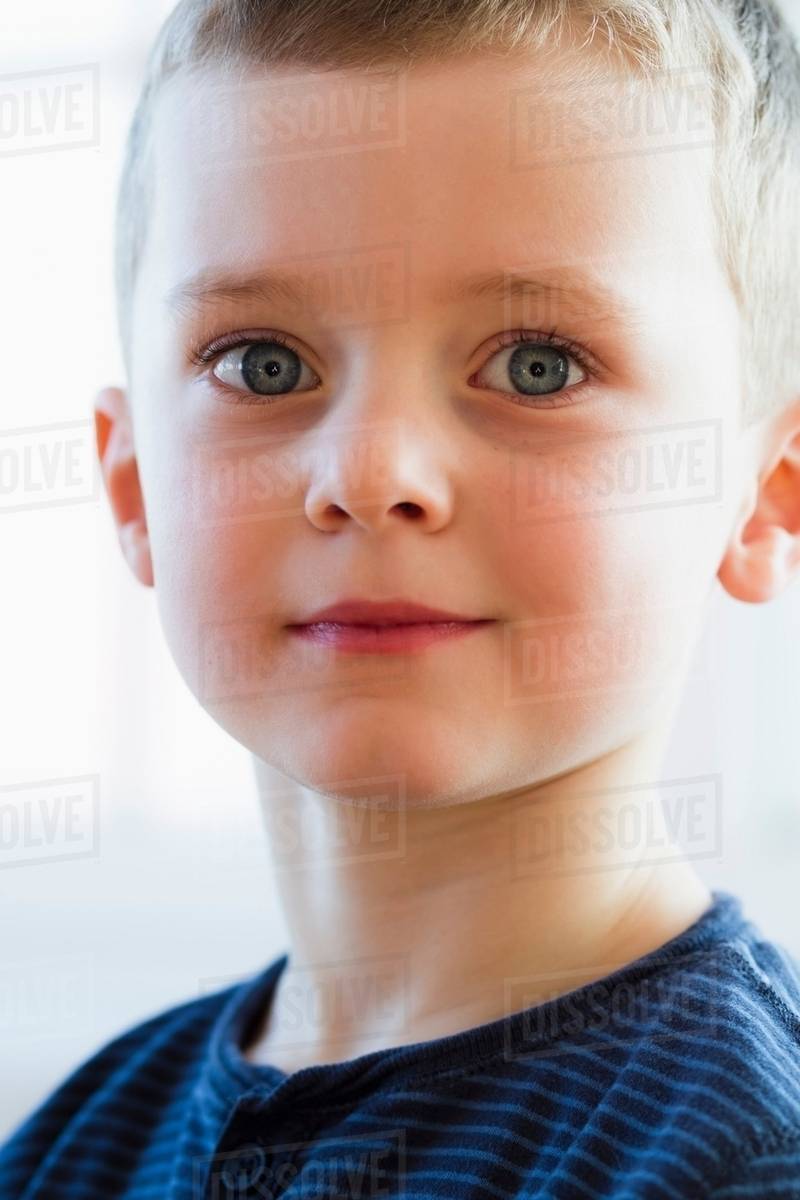 Close up of boys smiling face - Royalty-free Stock Photo | Dissolve