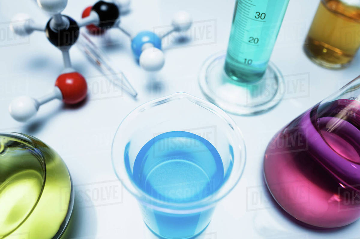 Chemistry research. Beaker containing copper sulfate (CuSO4) solution ...