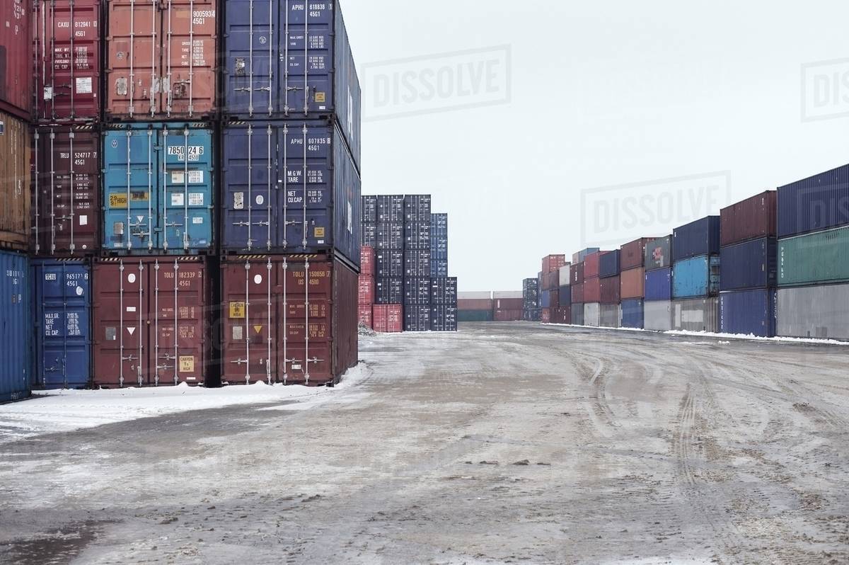 Containers in snowy harbor - Royalty-free Stock Photo | Dissolve