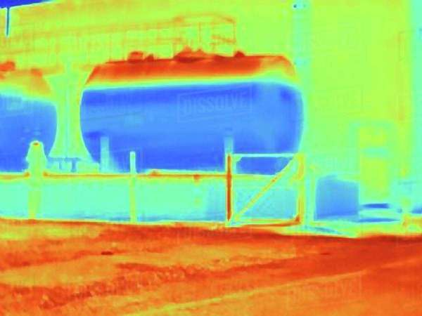 Thermal image of fuel storage tank - Stock Photo - Dissolve