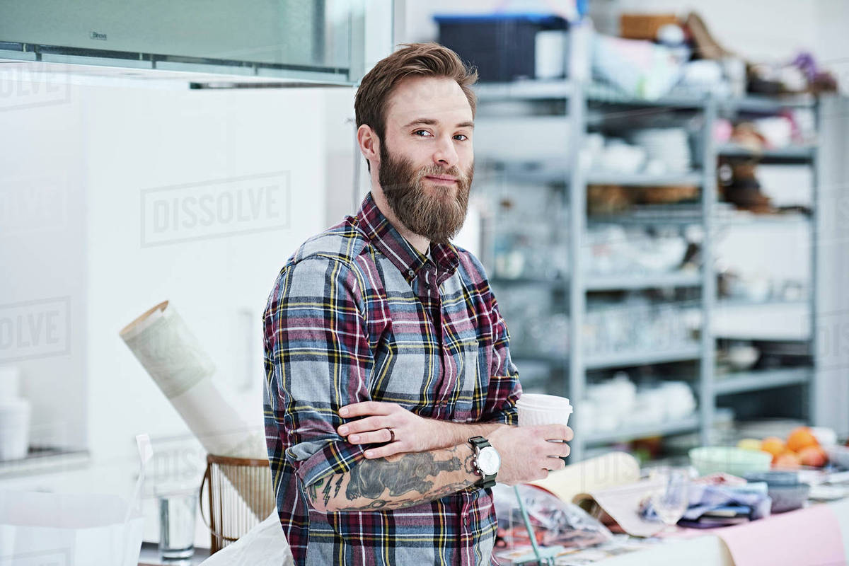 Portrait of young male designer in design studio - Royalty-free Stock ...