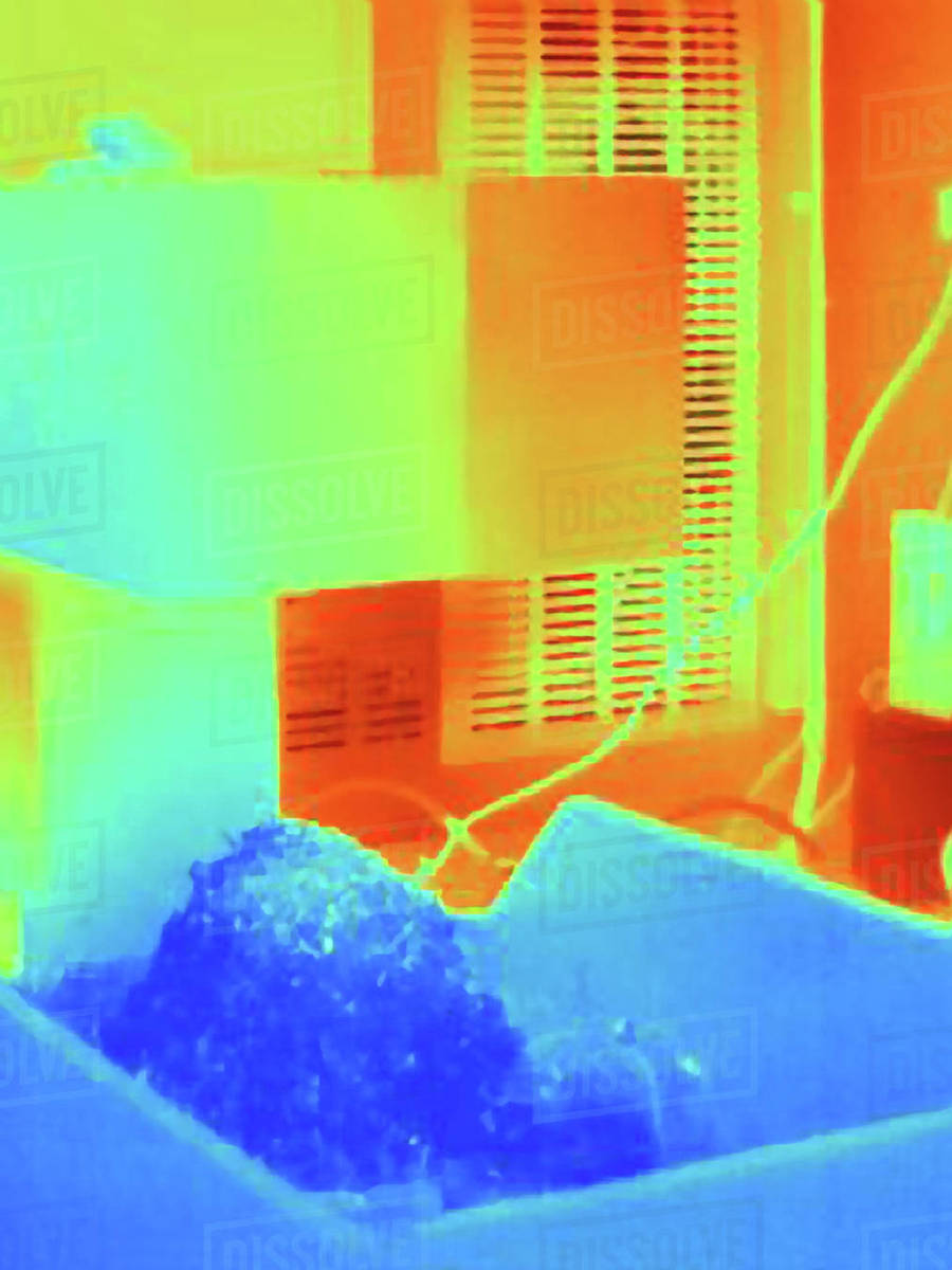 Thermal image of cold metal shavings falling from CNC machine - Royalty ...