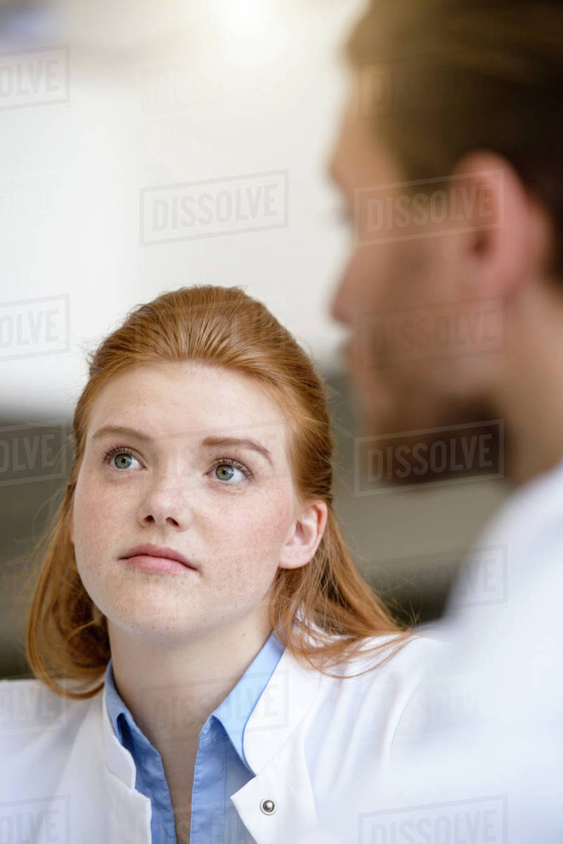Two doctors having discussion - Stock Photo - Dissolve