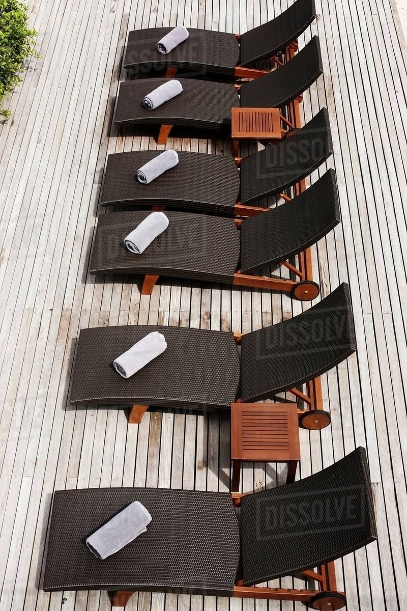 Aerial view of lawn chairs on deck - Royalty-free Stock Photo | Dissolve
