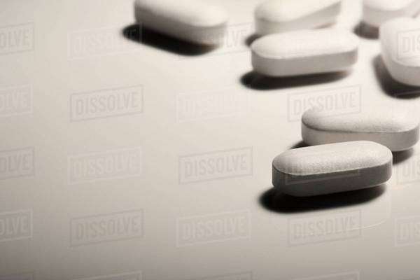 Close up of pills - Stock Photo - Dissolve