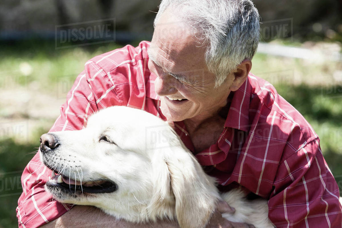 Man and pet dog - Royalty-free Stock Photo | Dissolve