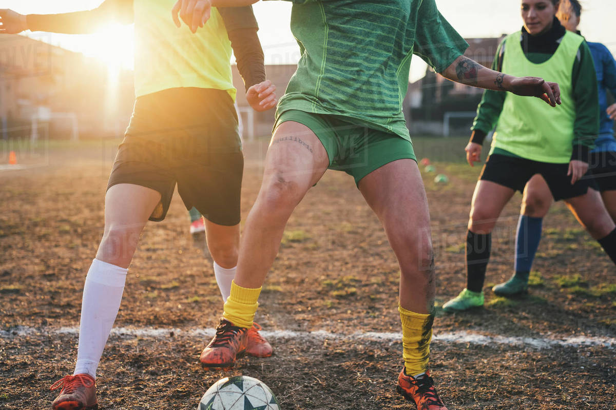 Football players playing on football pitch - Royalty-free Stock Photo ...