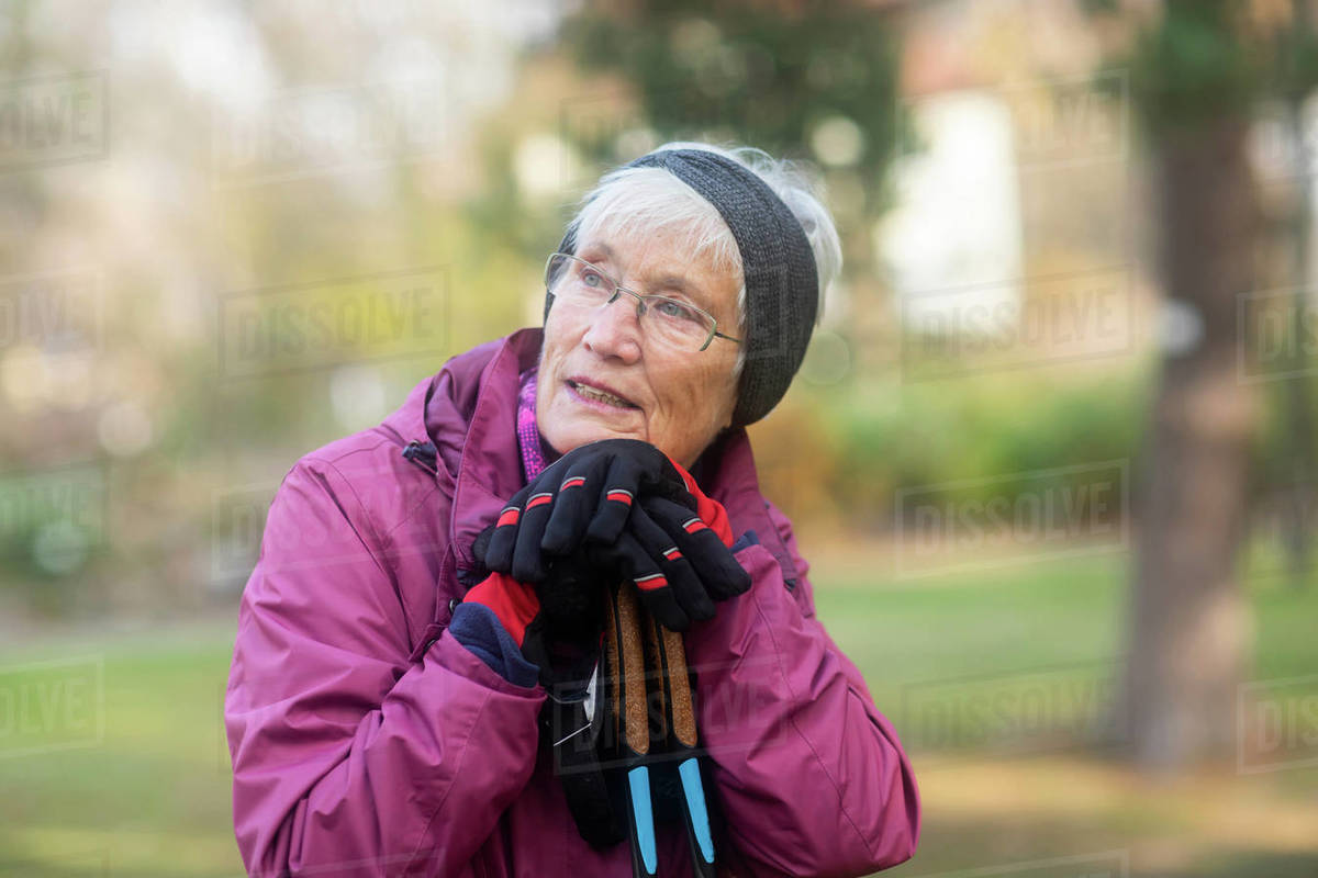 Senior woman resting from walk in park - Royalty-free Stock Photo ...