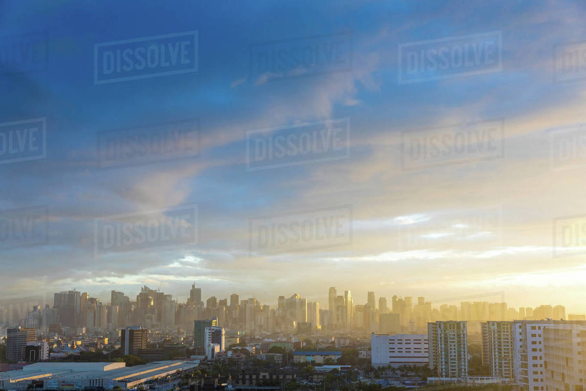 City skyline at sunset, Manila, Philippines - Royalty-free Stock Photo ...